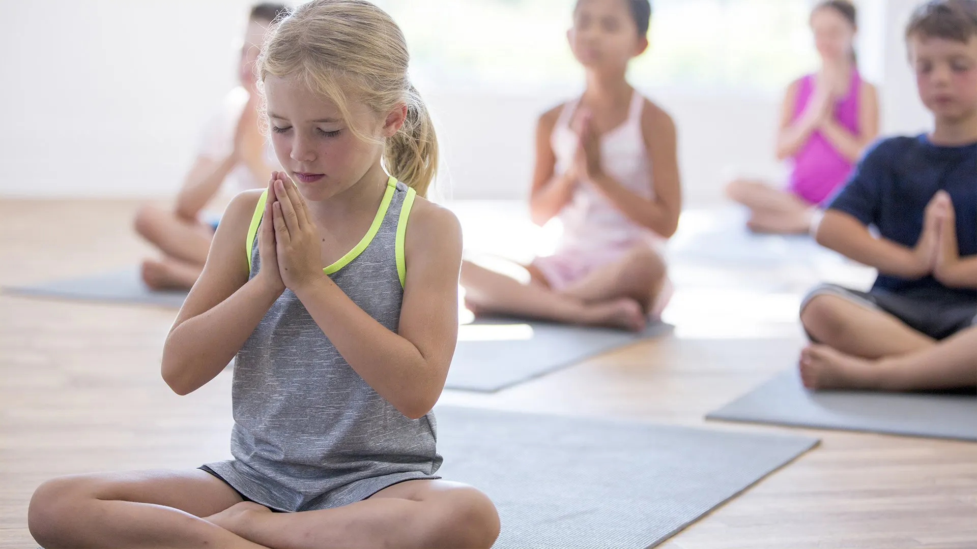 Using Yoga to Teach Kids to Stay Calm in Stressful Situations